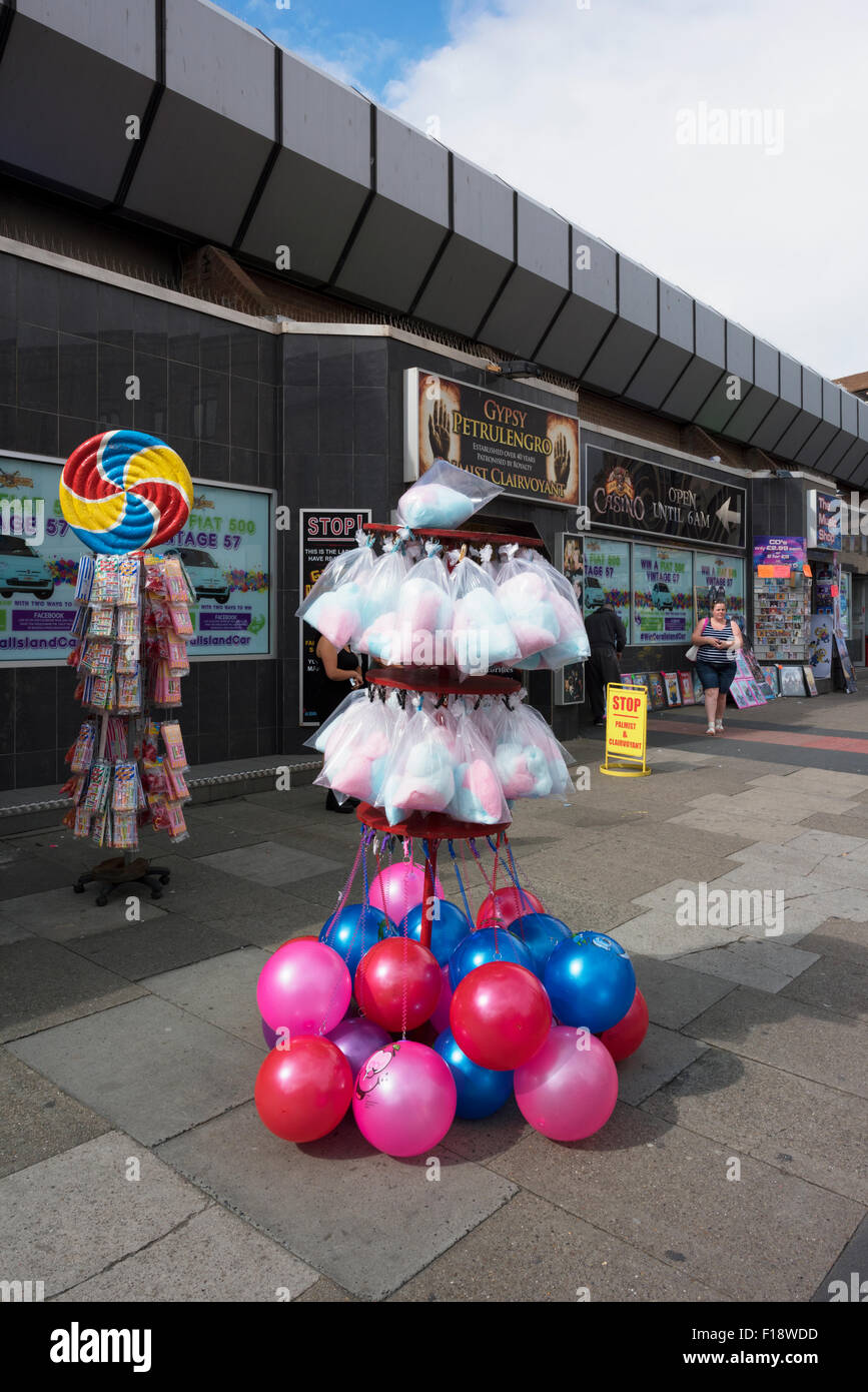 Beach balls and candy floss on a stand outside a shop in Blackpool ...
