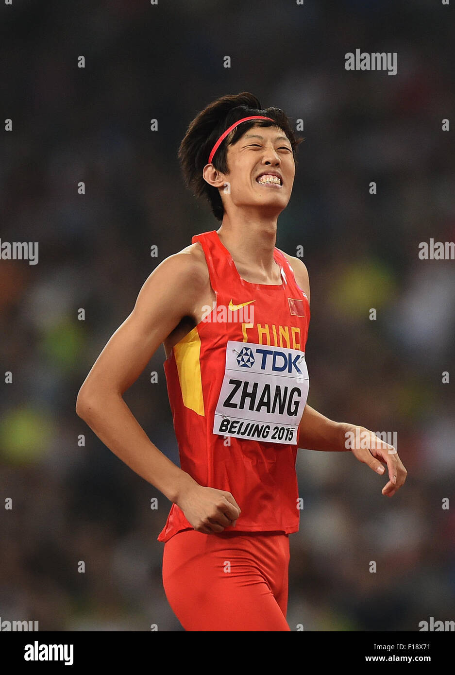 Beijing, China. 30th Aug, 2015. China's Zhang Guowei reacts during the ...