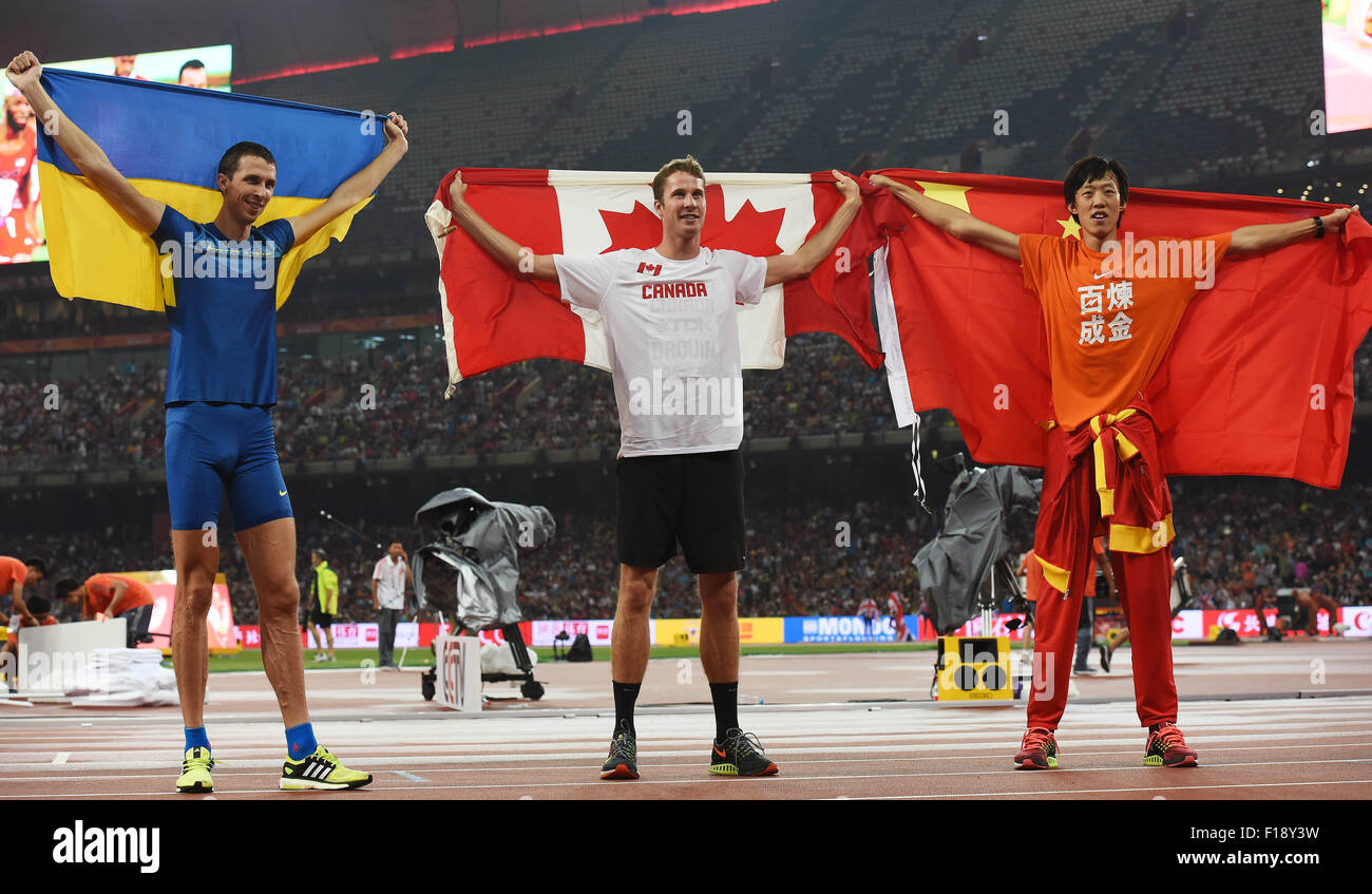 Beijing, China. 30th Aug, 2015. Canada's Derek Drouin (C), China's ...