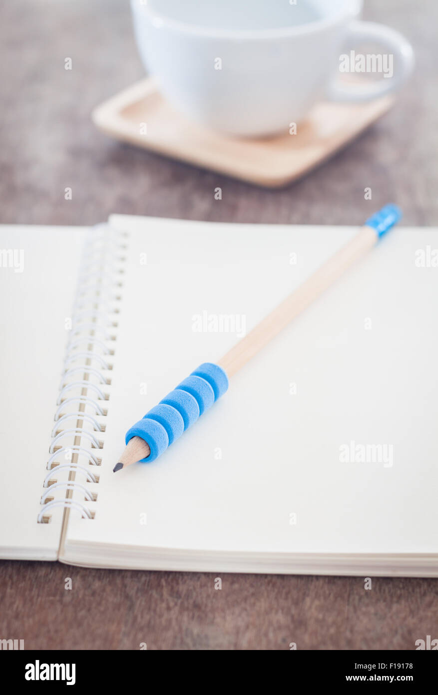 Open blank notebook with pencil, stock photo Stock Photo - Alamy