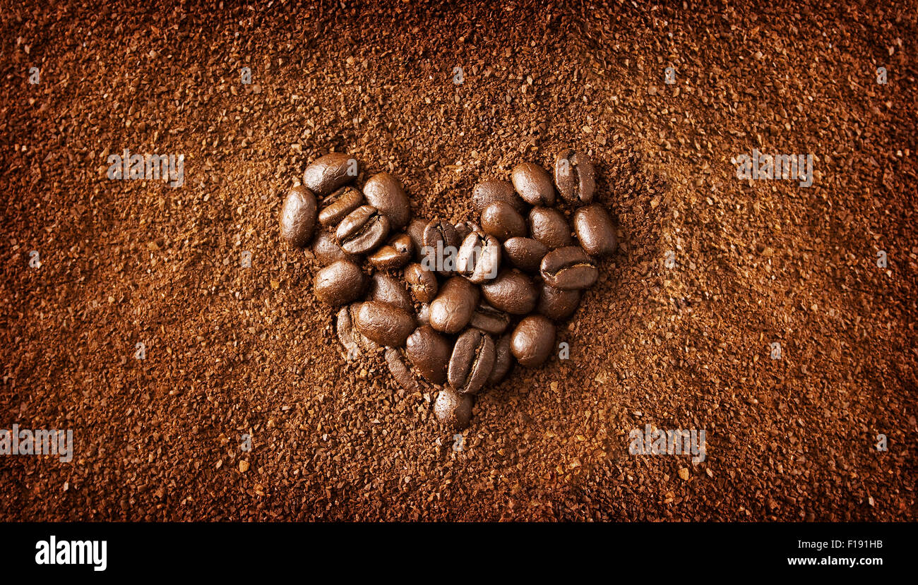 Heart shaped coffee beans Stock Photo - Alamy
