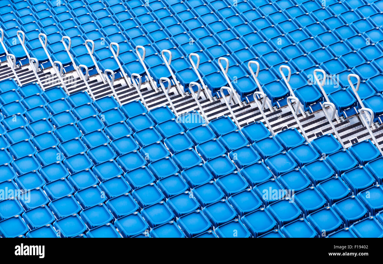 rows of blue seats in a stadium Stock Photo - Alamy