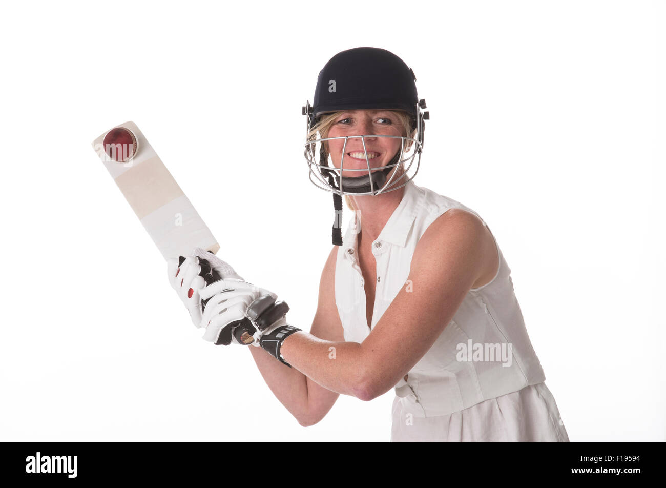 Female club cricket player hitting cricket ball with a bat cricket ...