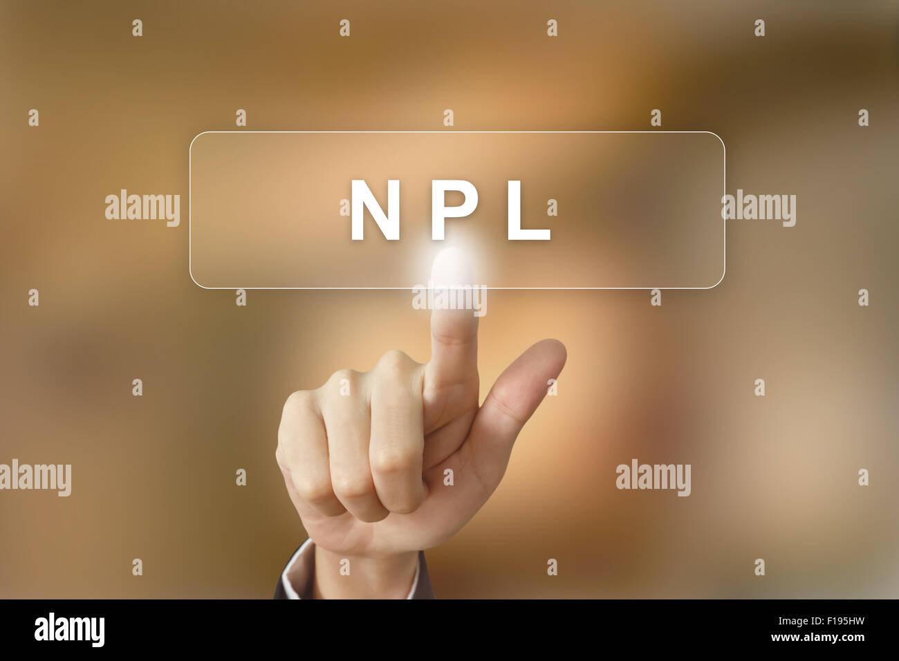 business hand pushing NPL or non performing loans button on blurred ...