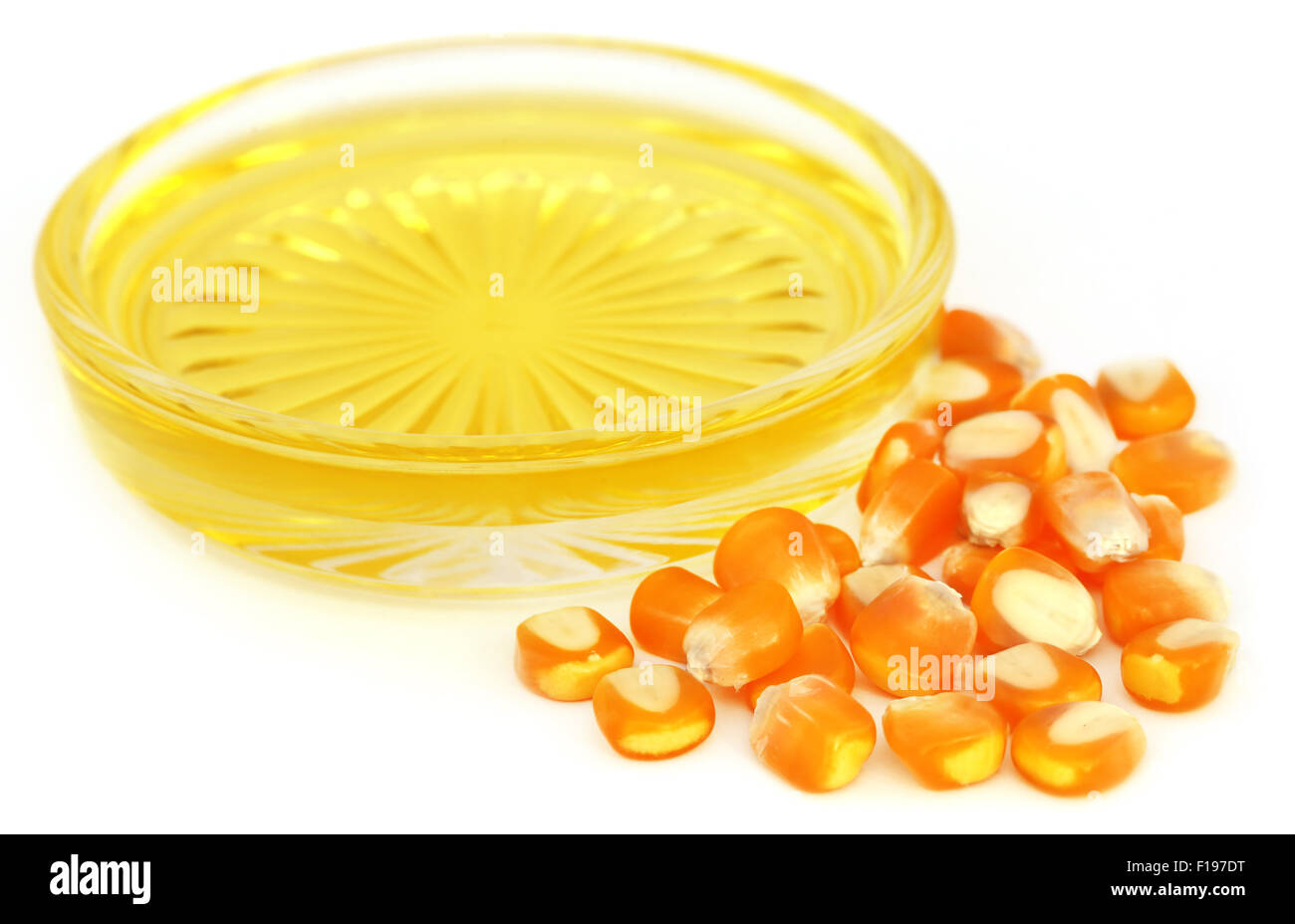 Oil with corn over white background Stock Photo - Alamy