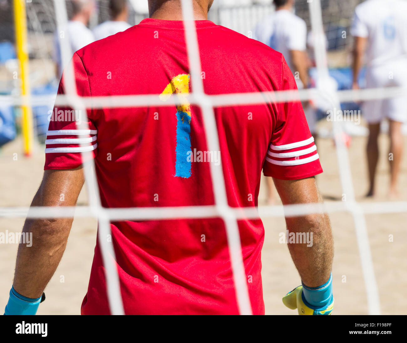 Goalkeeper at beach football tournament in Spain Stock Photo - Alamy