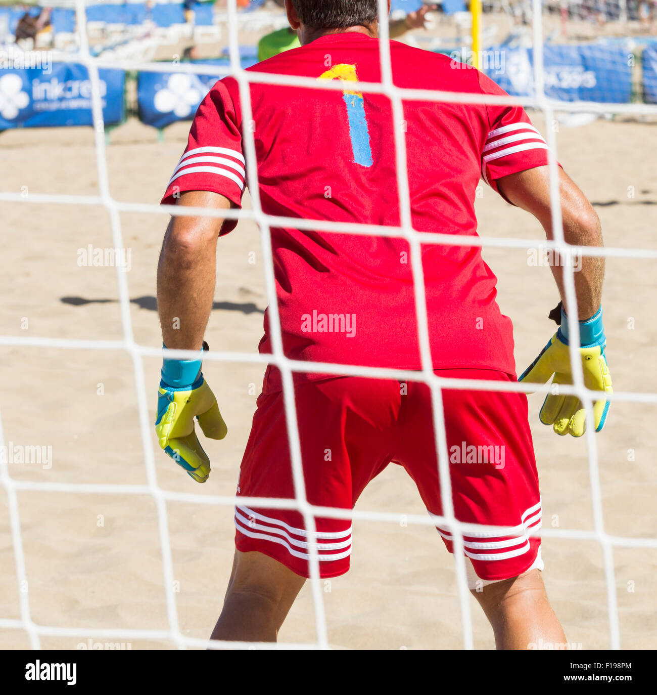Goalkeeper at beach football tournament in Spain Stock Photo - Alamy