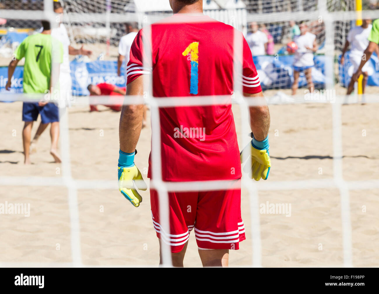 Goalkeeper at beach football tournament in Spain Stock Photo - Alamy