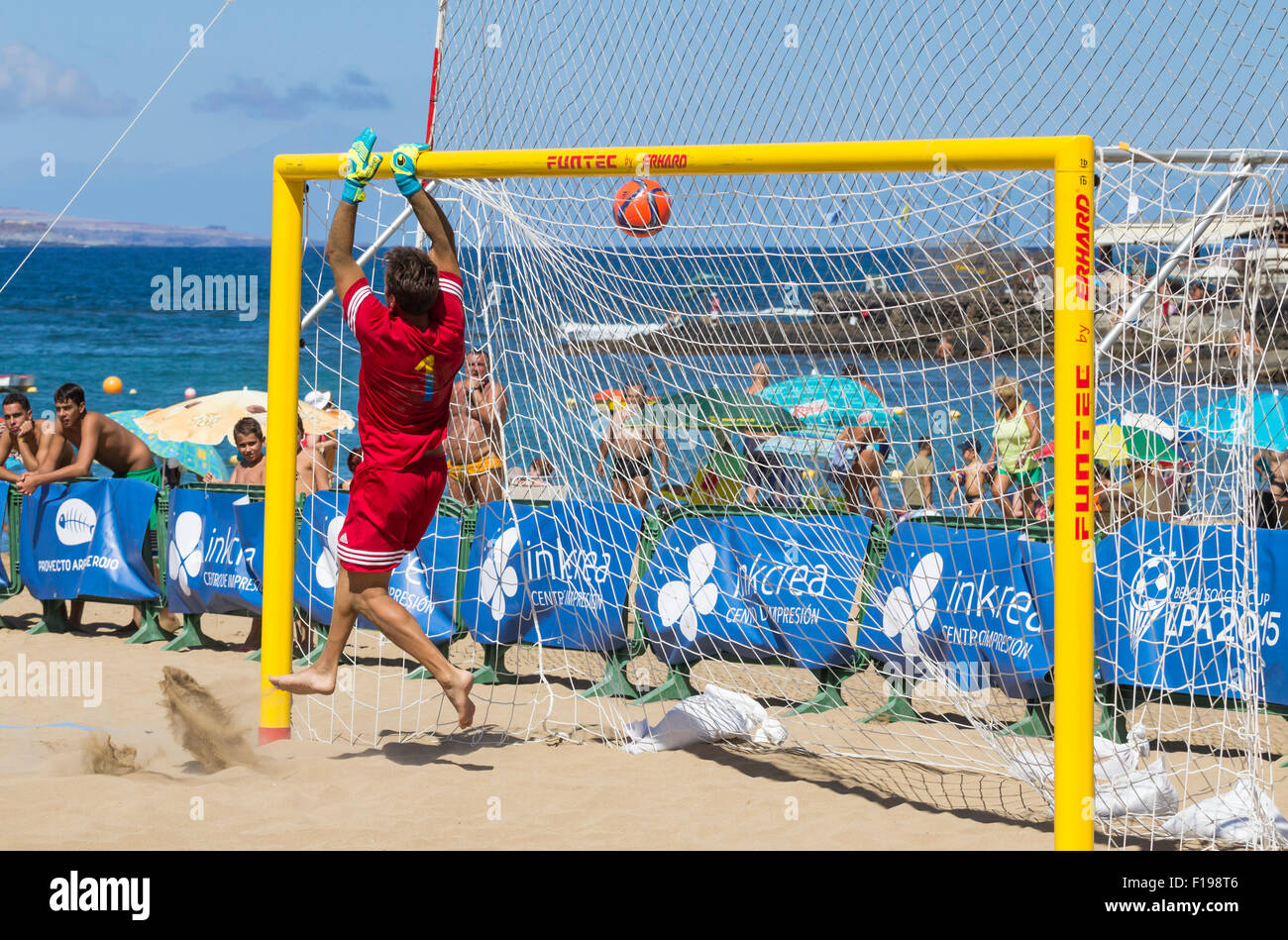Goalkeeper at beach football tournament in Spain Stock Photo - Alamy