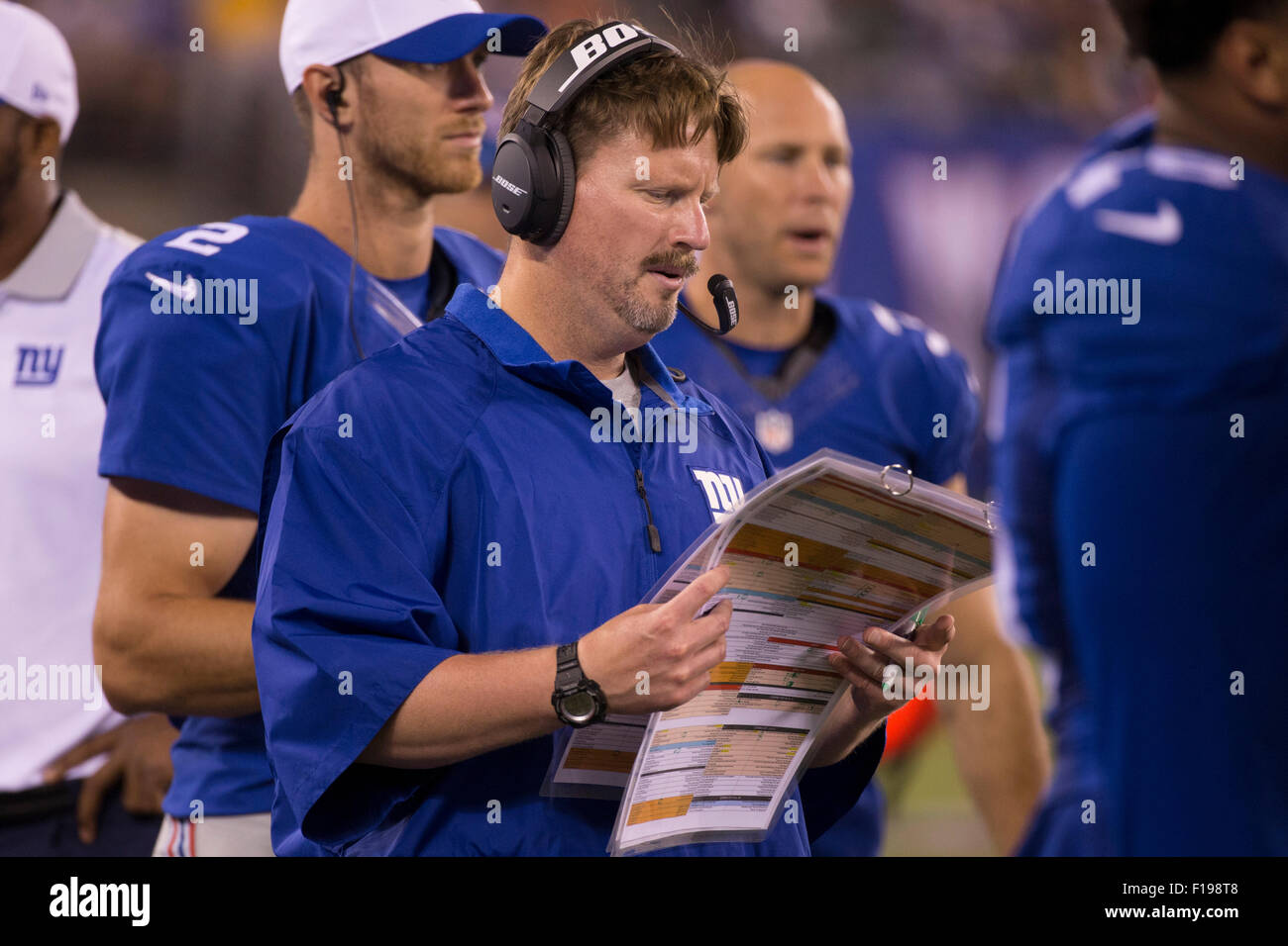 August 29, 2015: New York Giants offensive coordinator Ben McAdoo looks ...