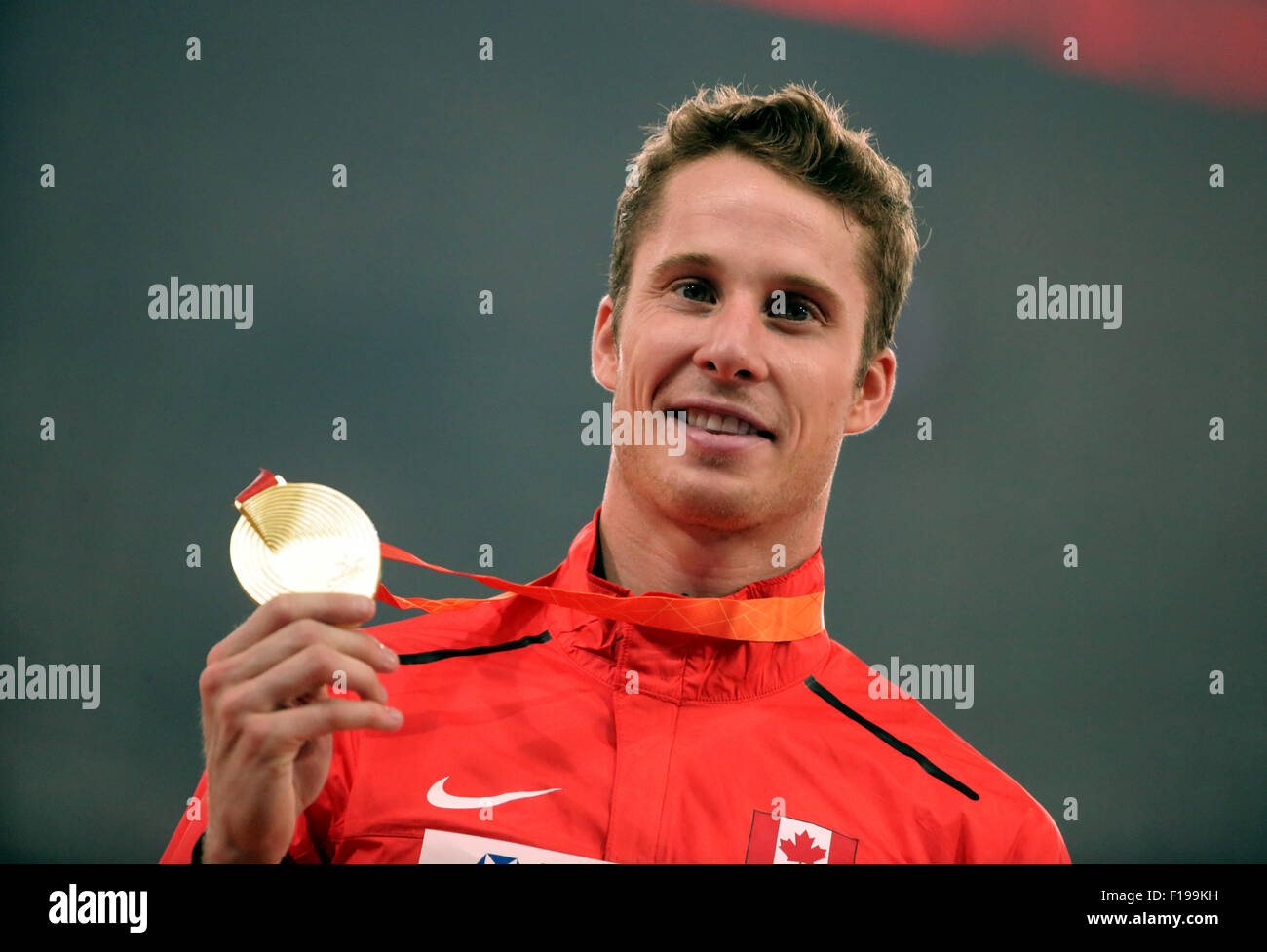 Beijing, China. 30th Aug, 2015. Canada's Derek Drouin poses with his ...