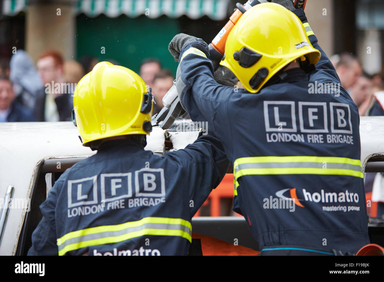 The London Fire Brigade extraction team demonstrate rescuing simulated ...