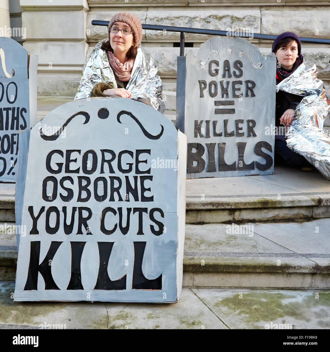 Activists from Fuel Poverty Action protest outside the Treasury ...