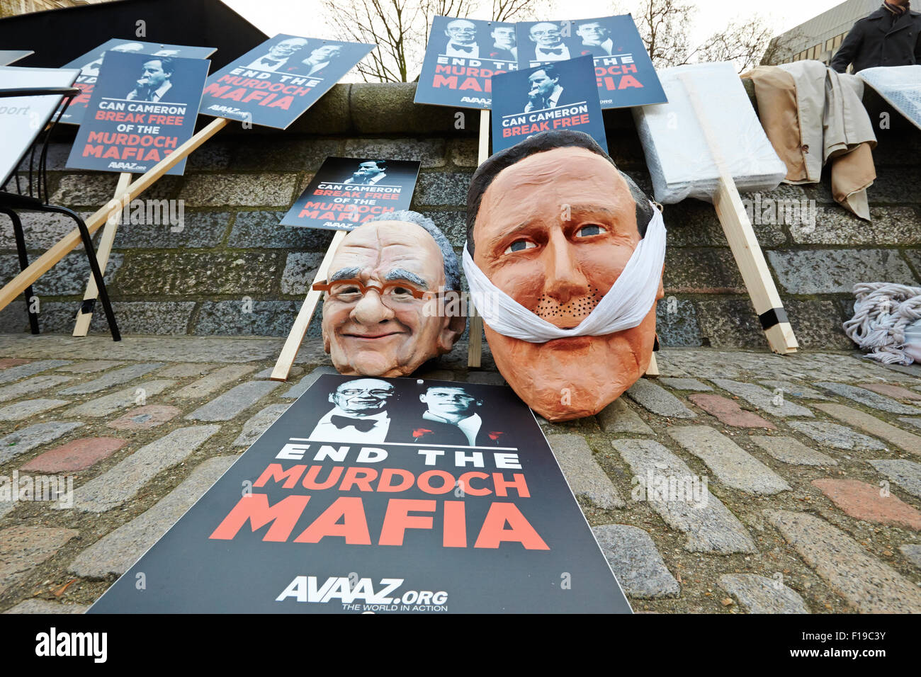Rupert Murdoch and David Cameron masks created by Avaaz to highlight ...