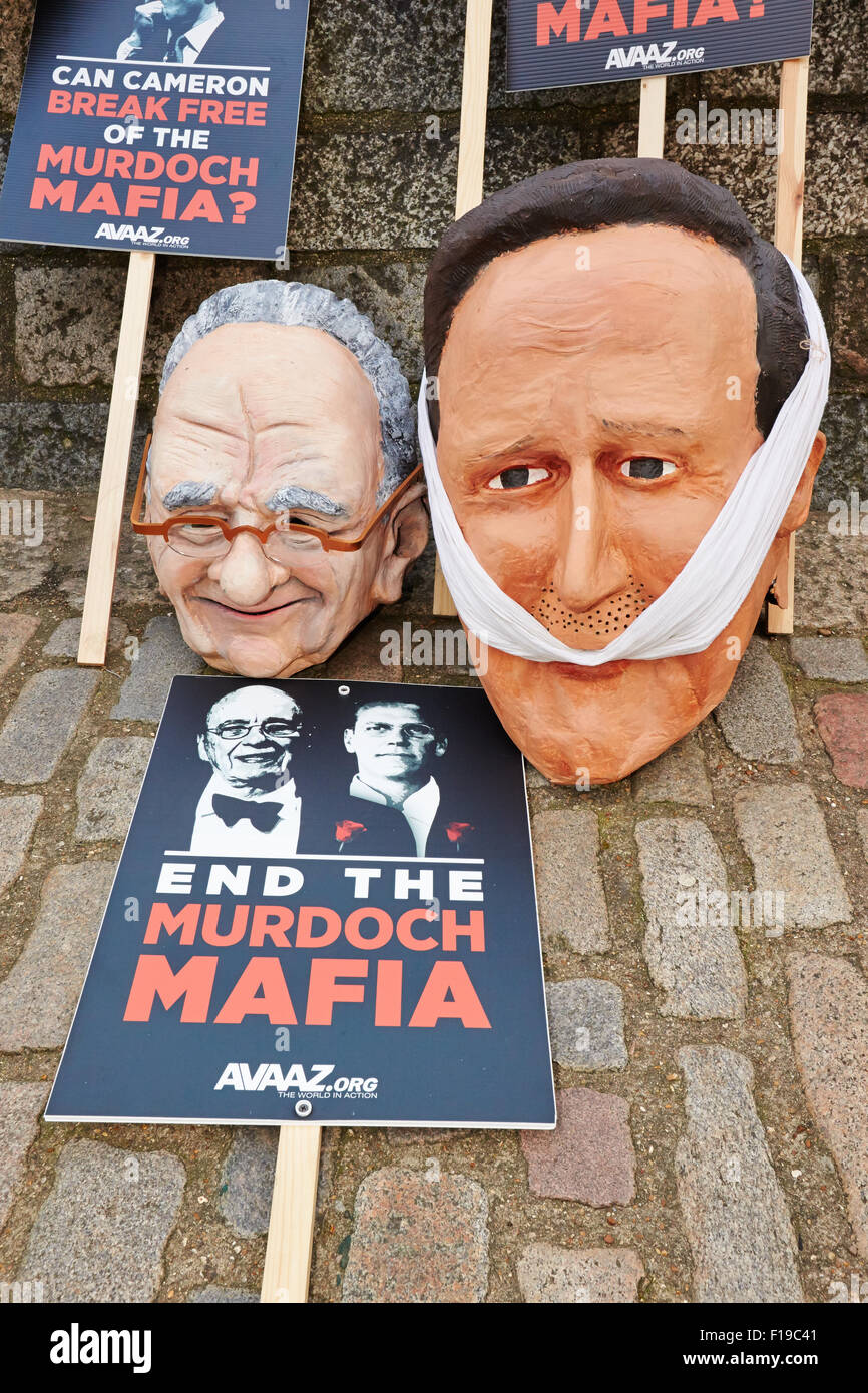 Rupert Murdoch and David Cameron masks created by Avaaz to highlight ...