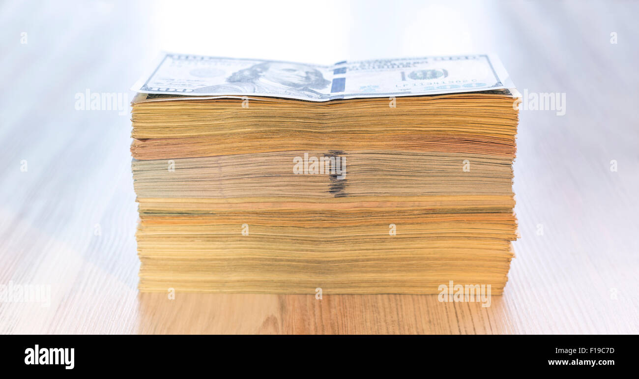 Thick stack of US cash Stock Photo - Alamy