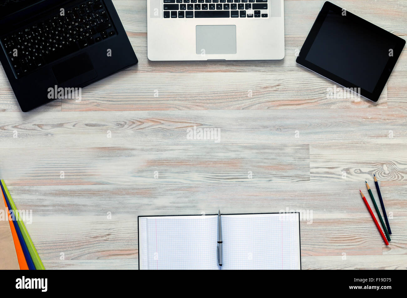 Notepad and laptop on wood table. View from above Stock Photo - Alamy