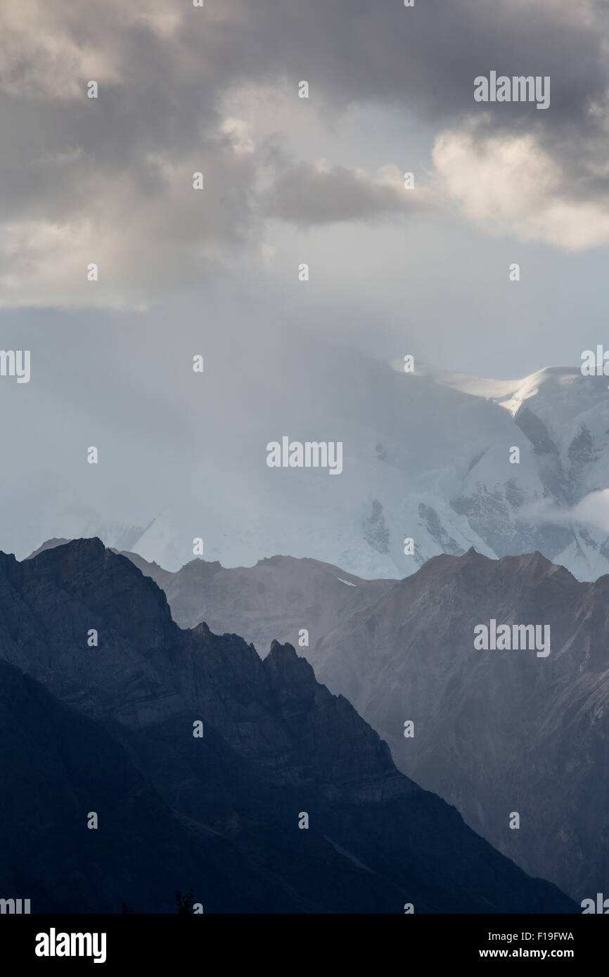 Clouds gather around Mount Blackburn in the Wrangell Mountains at ...