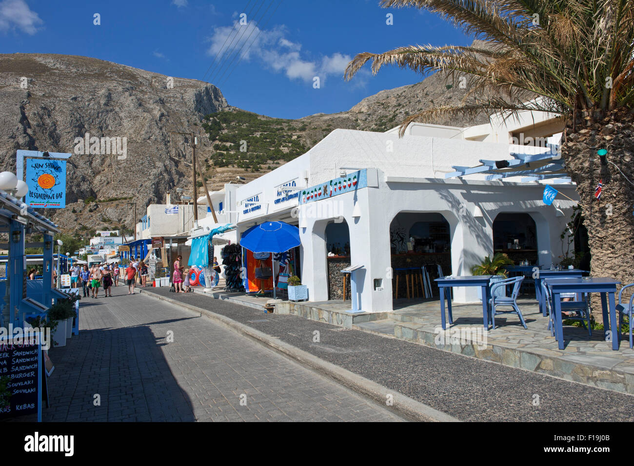 A row of restaurants and shops in Kamari, Santorini, Greece Stock Photo ...