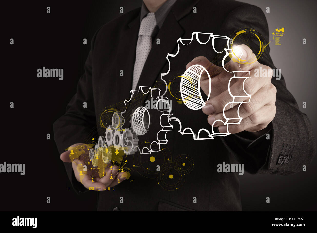 businessman hand show gear to success as concept Stock Photo - Alamy