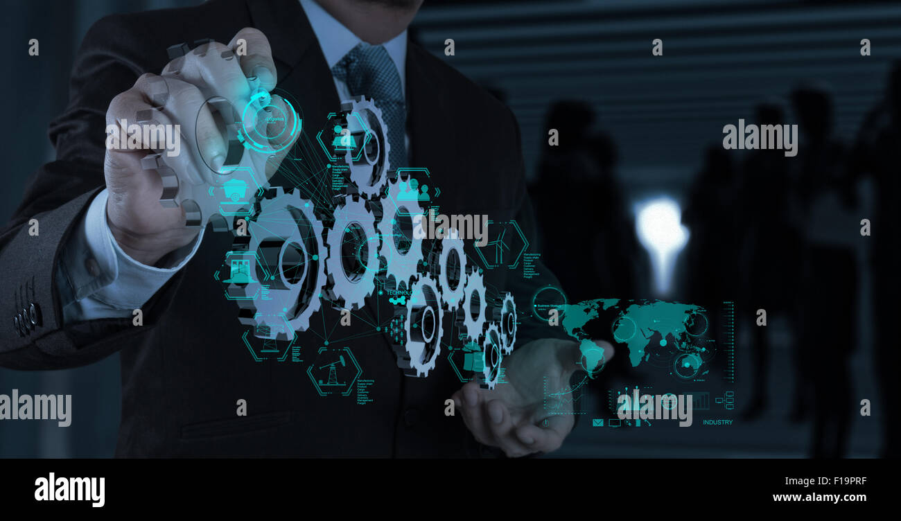 businessman hand draws gear to success concept Stock Photo - Alamy