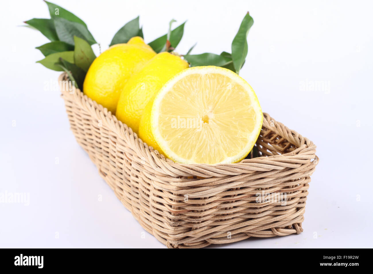 lemons in basket Stock Photo - Alamy
