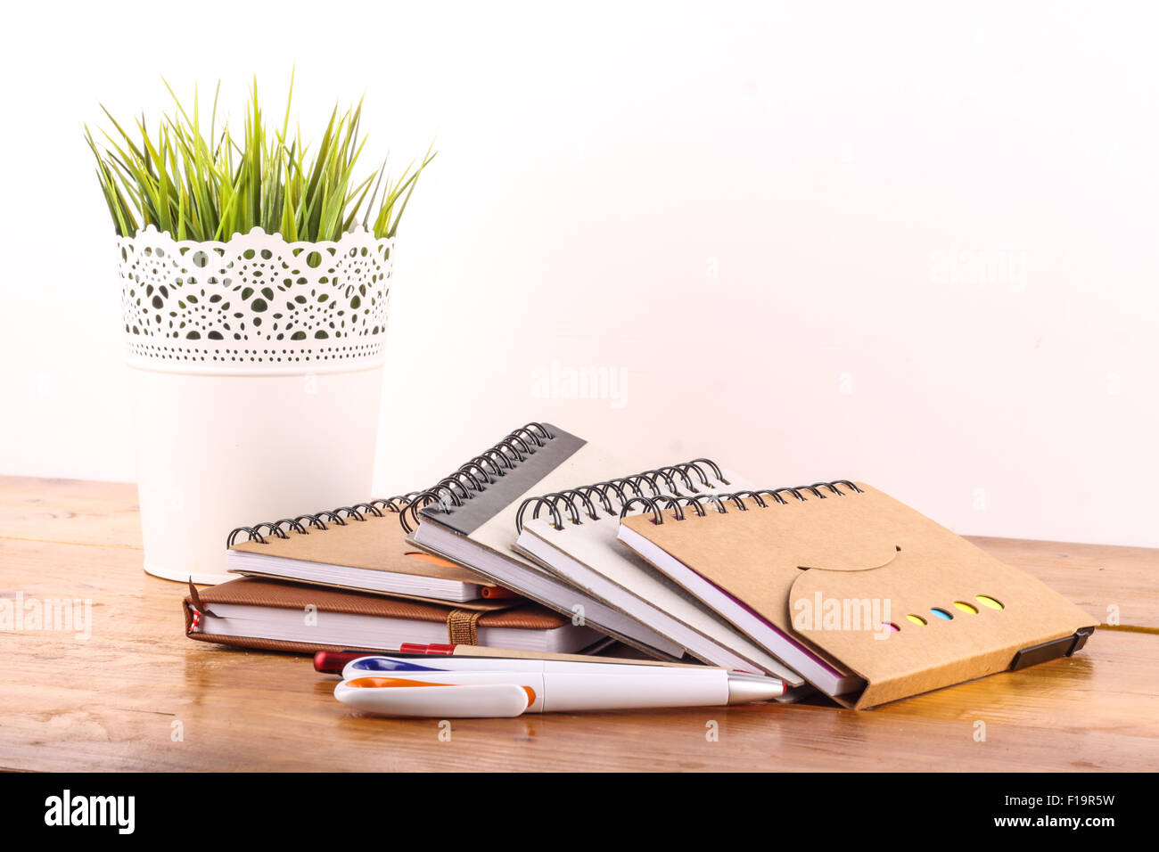 notebook and pen placed on a table littered with clean background Stock ...
