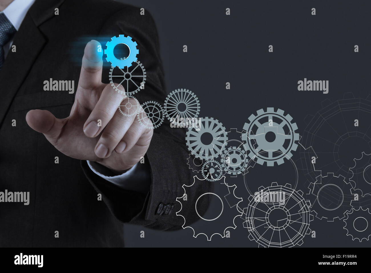 businessman hand draws gear to success concept Stock Photo - Alamy