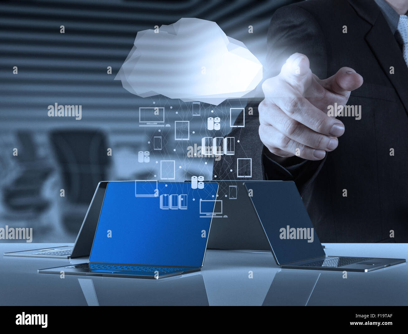 Businessman hand working with a Cloud Computing diagram on the new ...