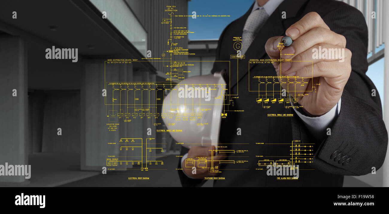 engineer draws an electronic single line schematic diagram Stock Photo ...