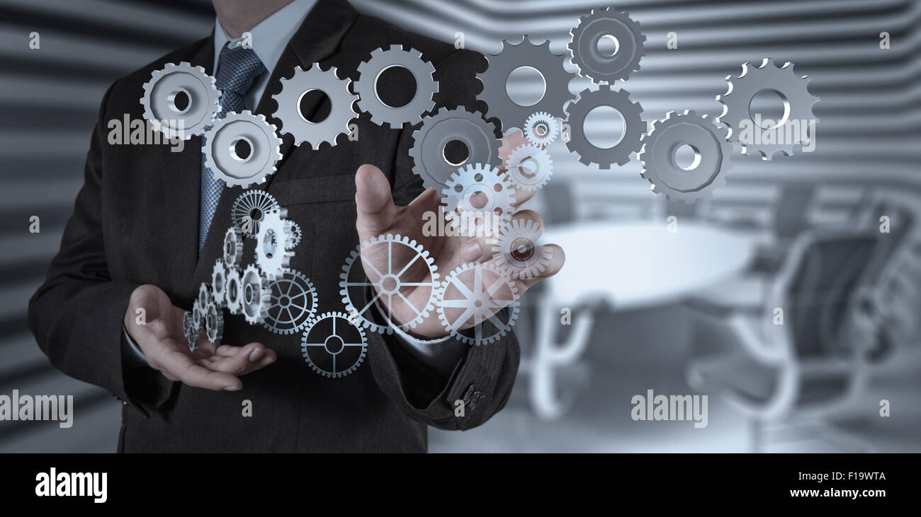 businessman hand draws gear to success concept Stock Photo - Alamy