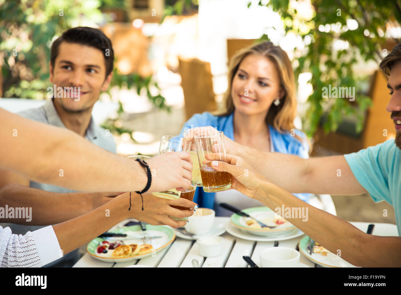 Female friends making toast at restaurant hi-res stock photography and ...