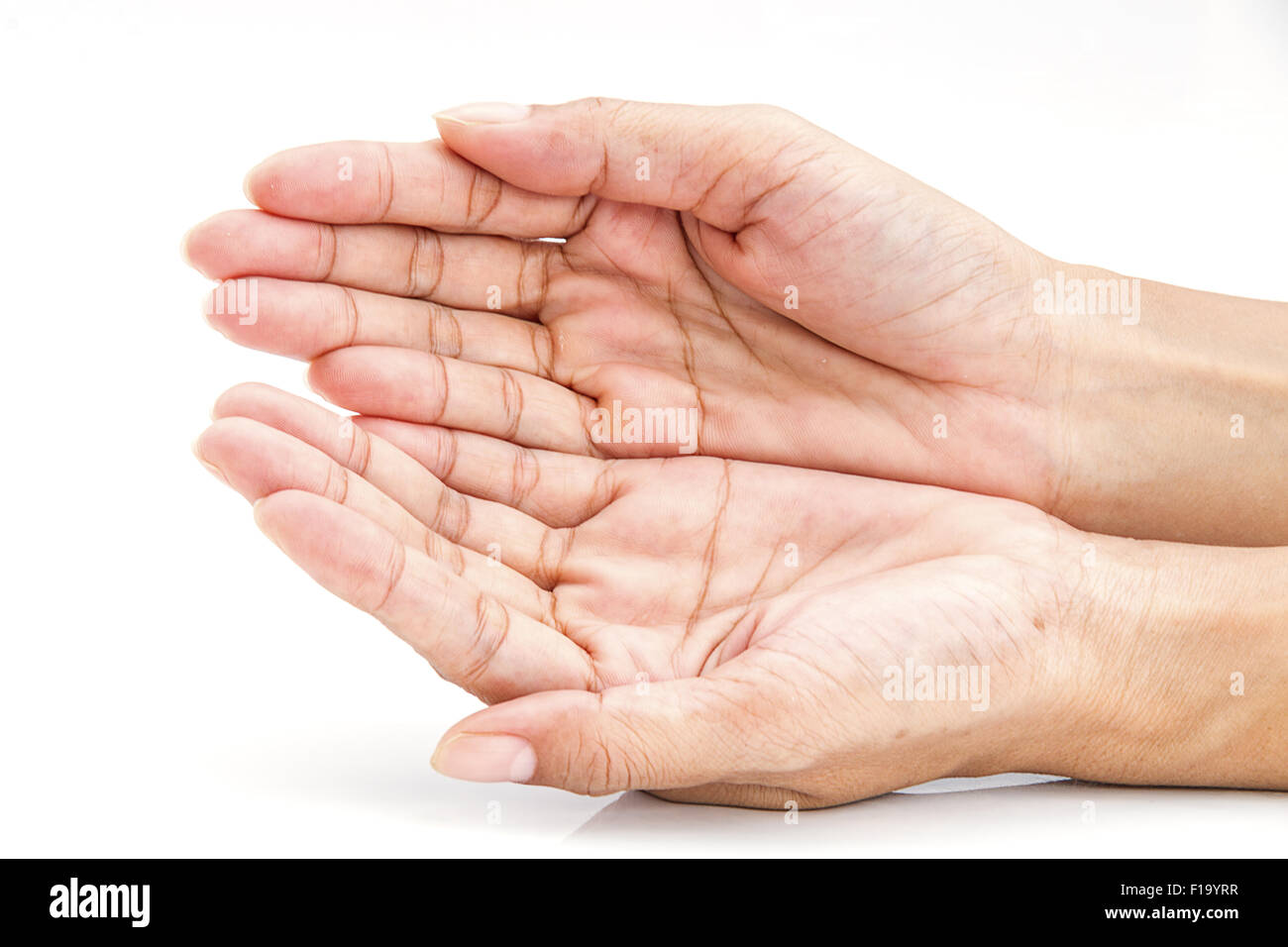 woman hands with open palms over white table Stock Photo - Alamy