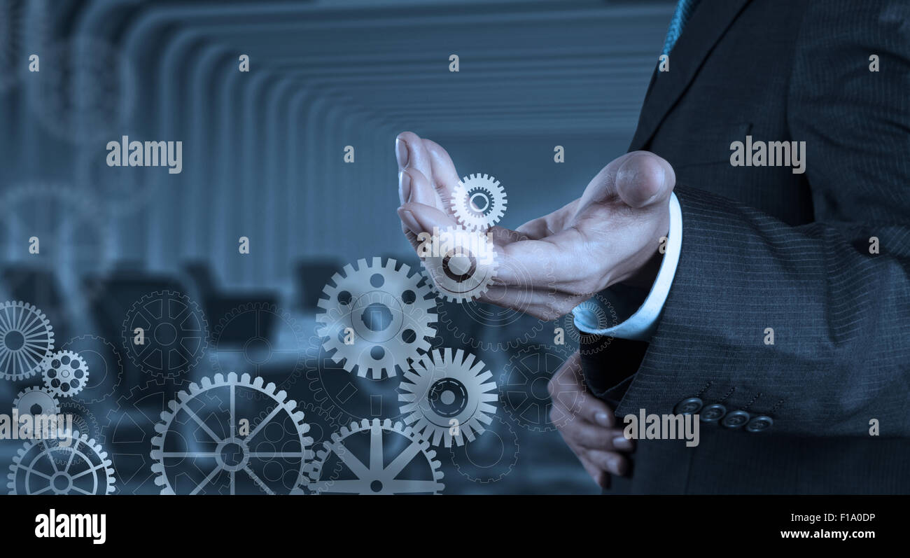 businessman hand draws gear to success concept Stock Photo - Alamy