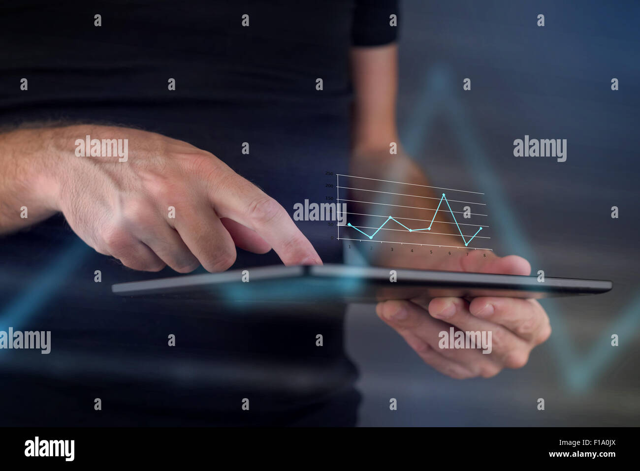 Business chart diagram on digital tablet computer, hands tapping touch ...