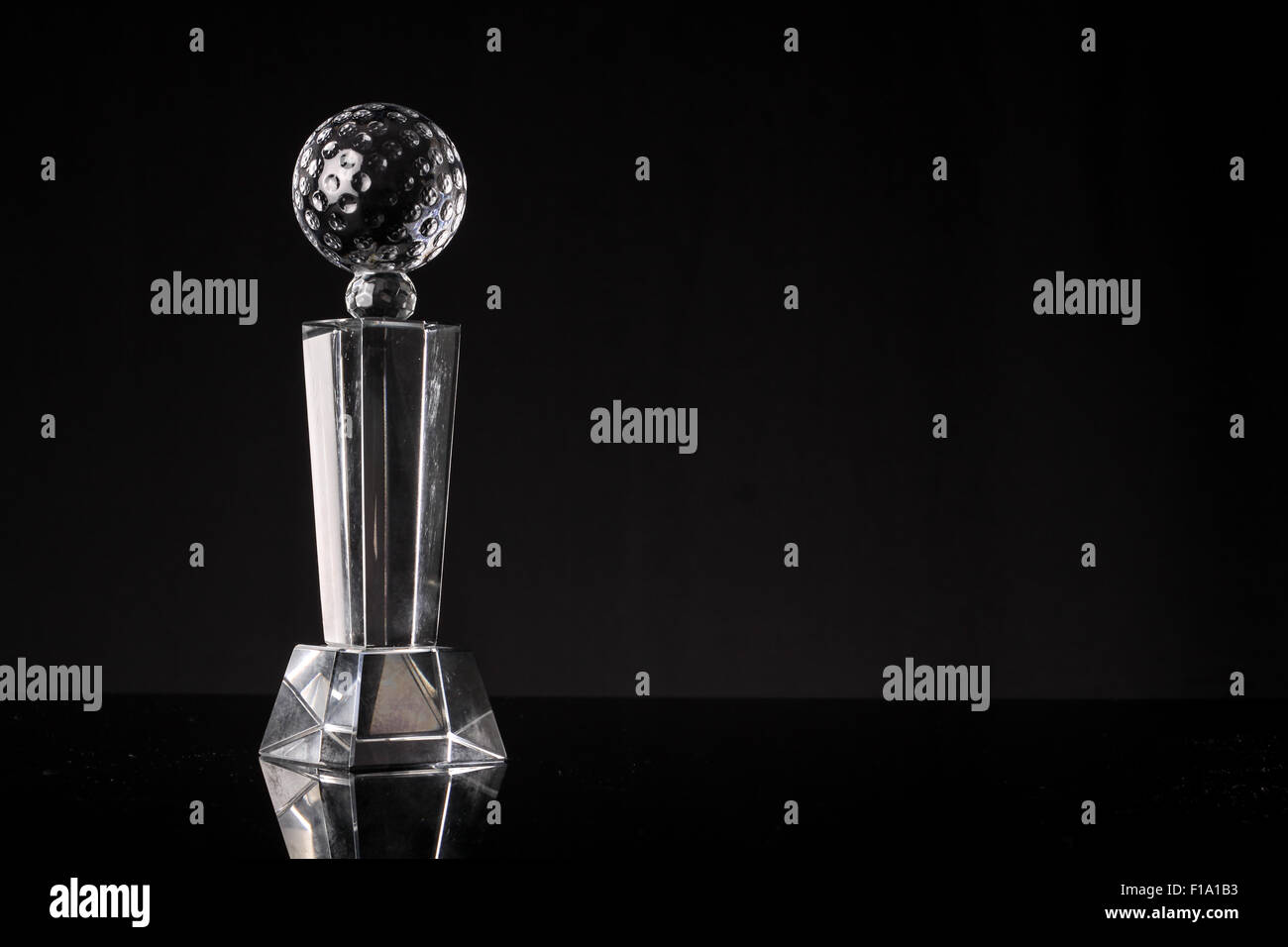 glass trophy in black background Stock Photo - Alamy
