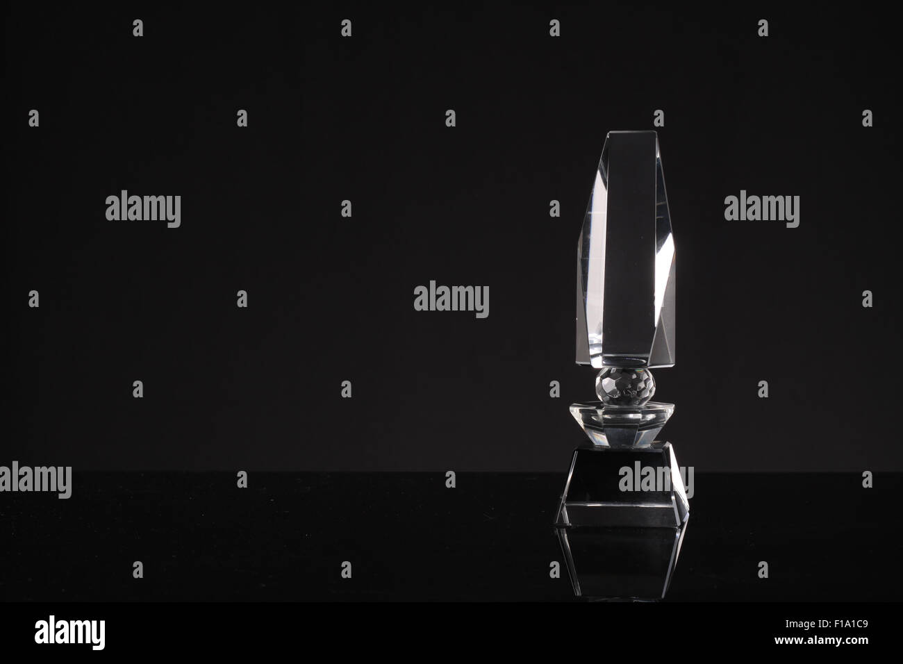 glass trophy in black background Stock Photo - Alamy