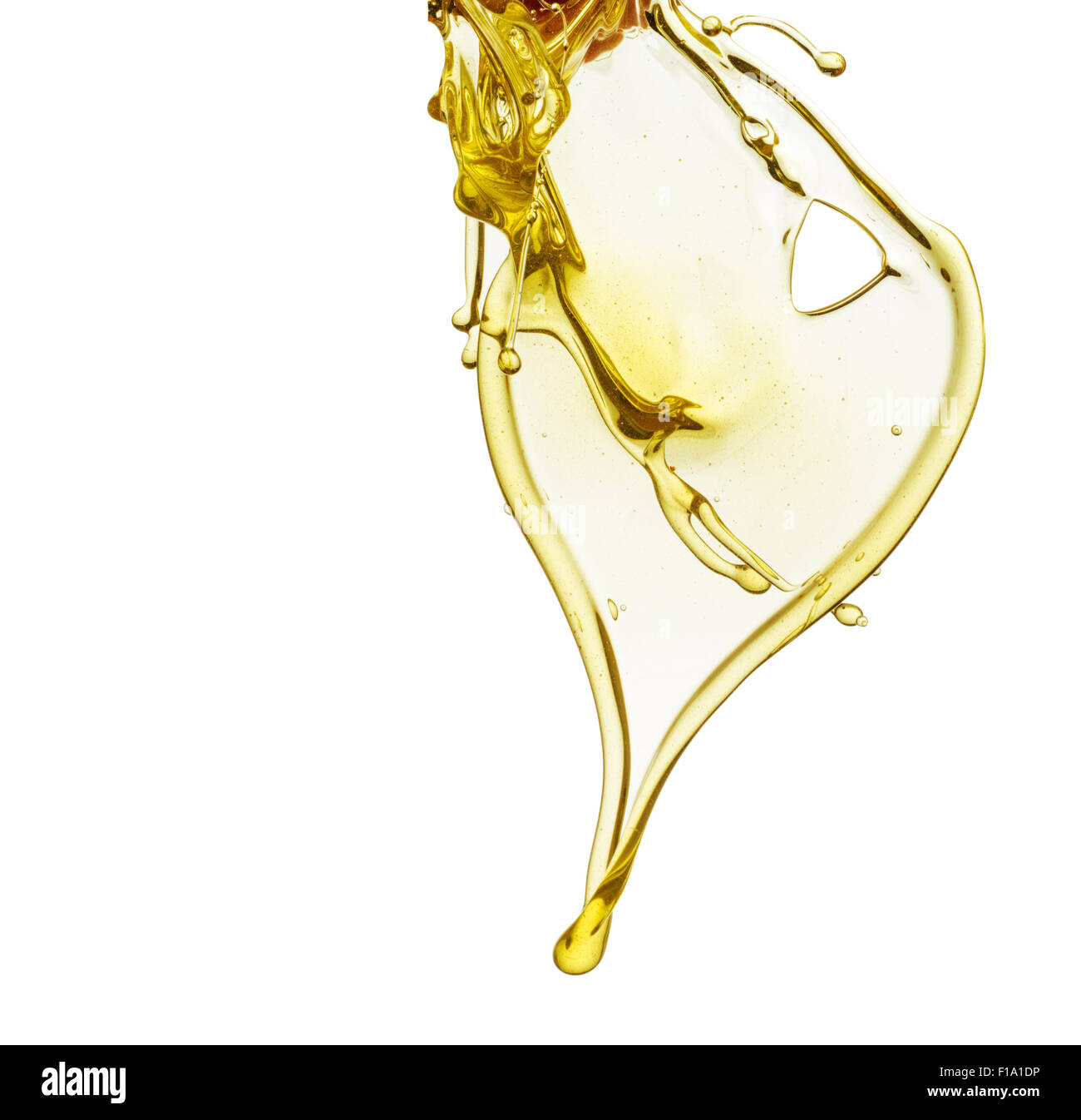 Oil splash isolated on white background Stock Photo - Alamy