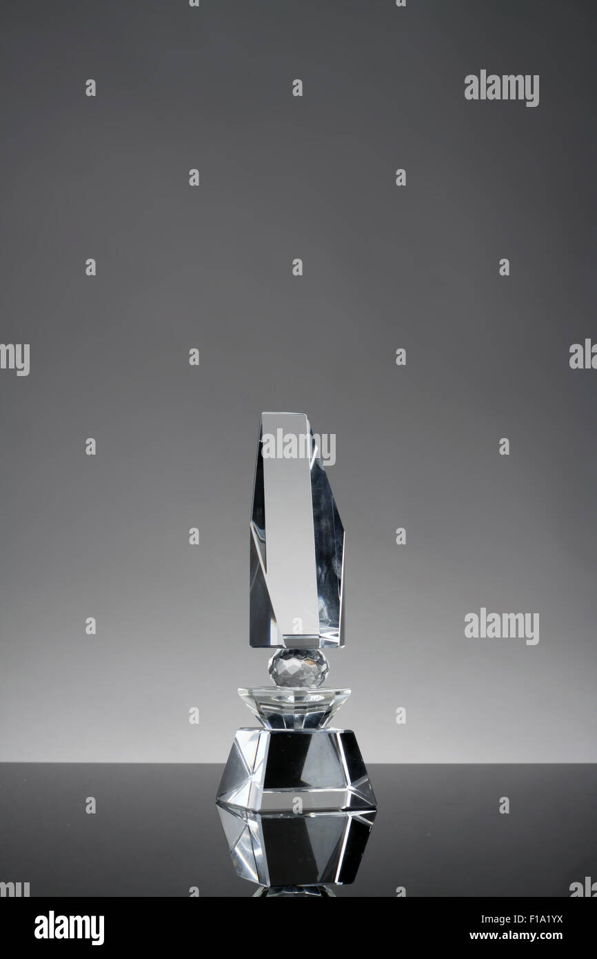 glass trophy in gray background Stock Photo - Alamy