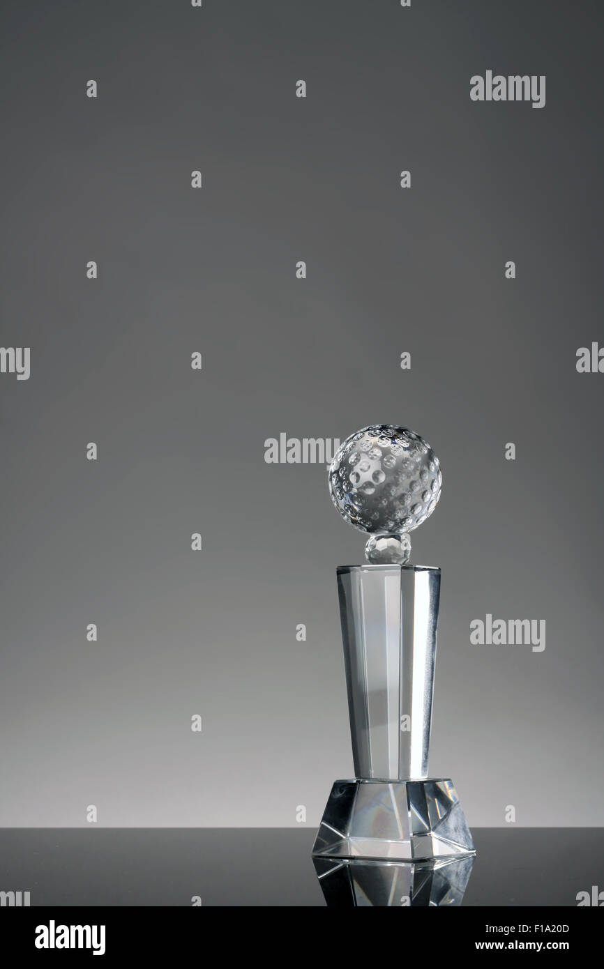 glass trophy in gray background Stock Photo - Alamy