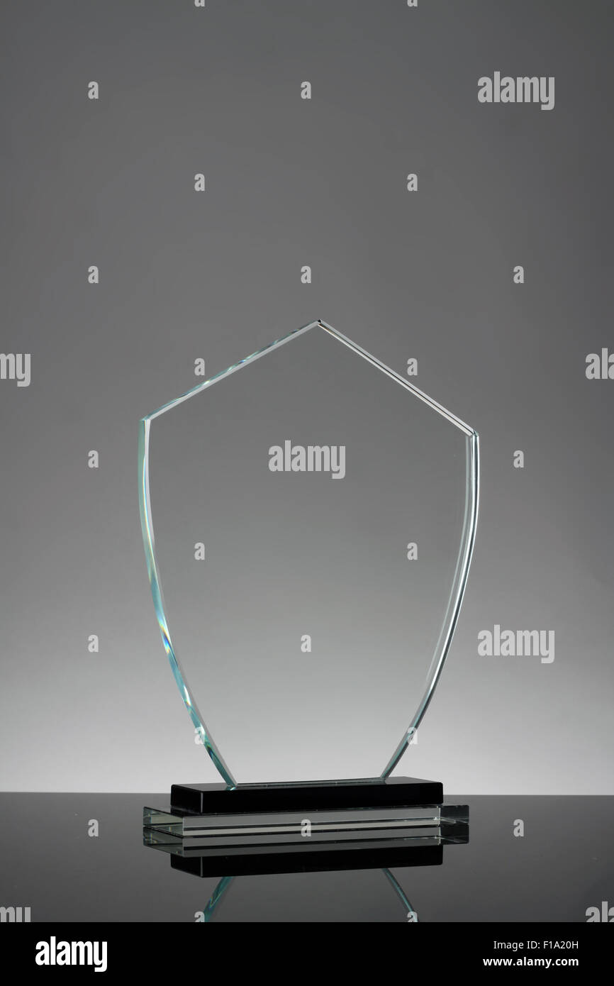 glass trophy in gray background Stock Photo - Alamy