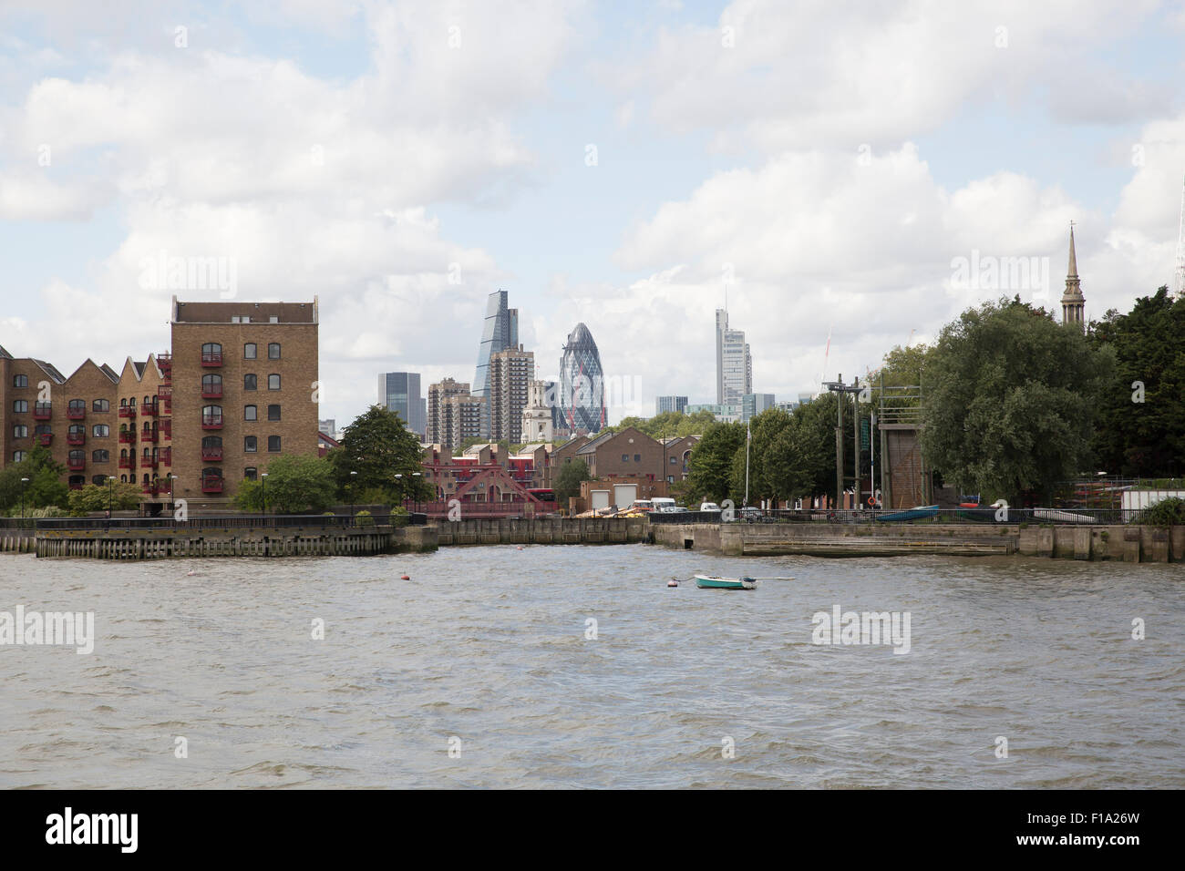 Riverside apartments and office buildings as seen from the River Thames ...