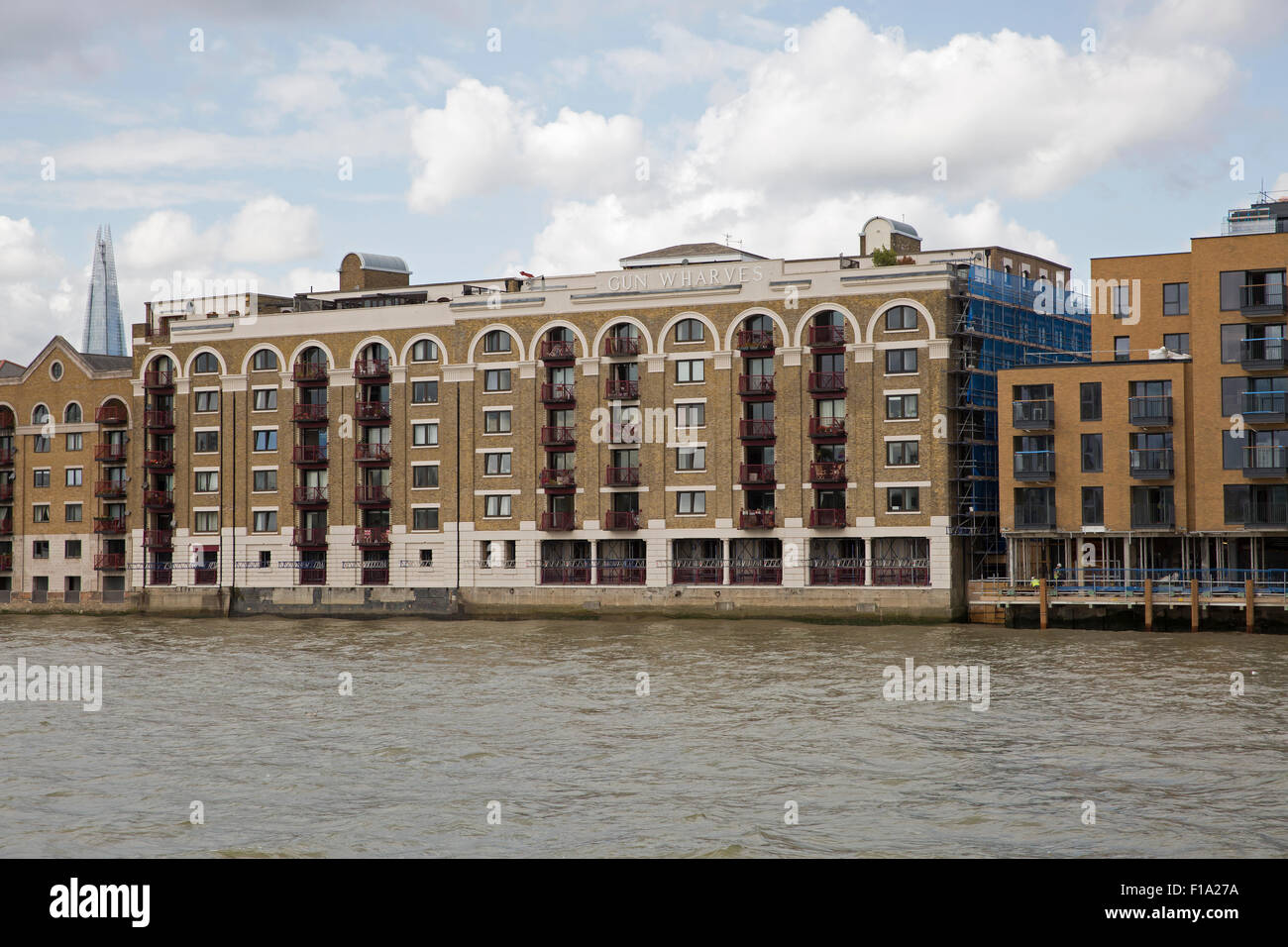 Riverside apartments and office buildings as seen from the River Thames ...