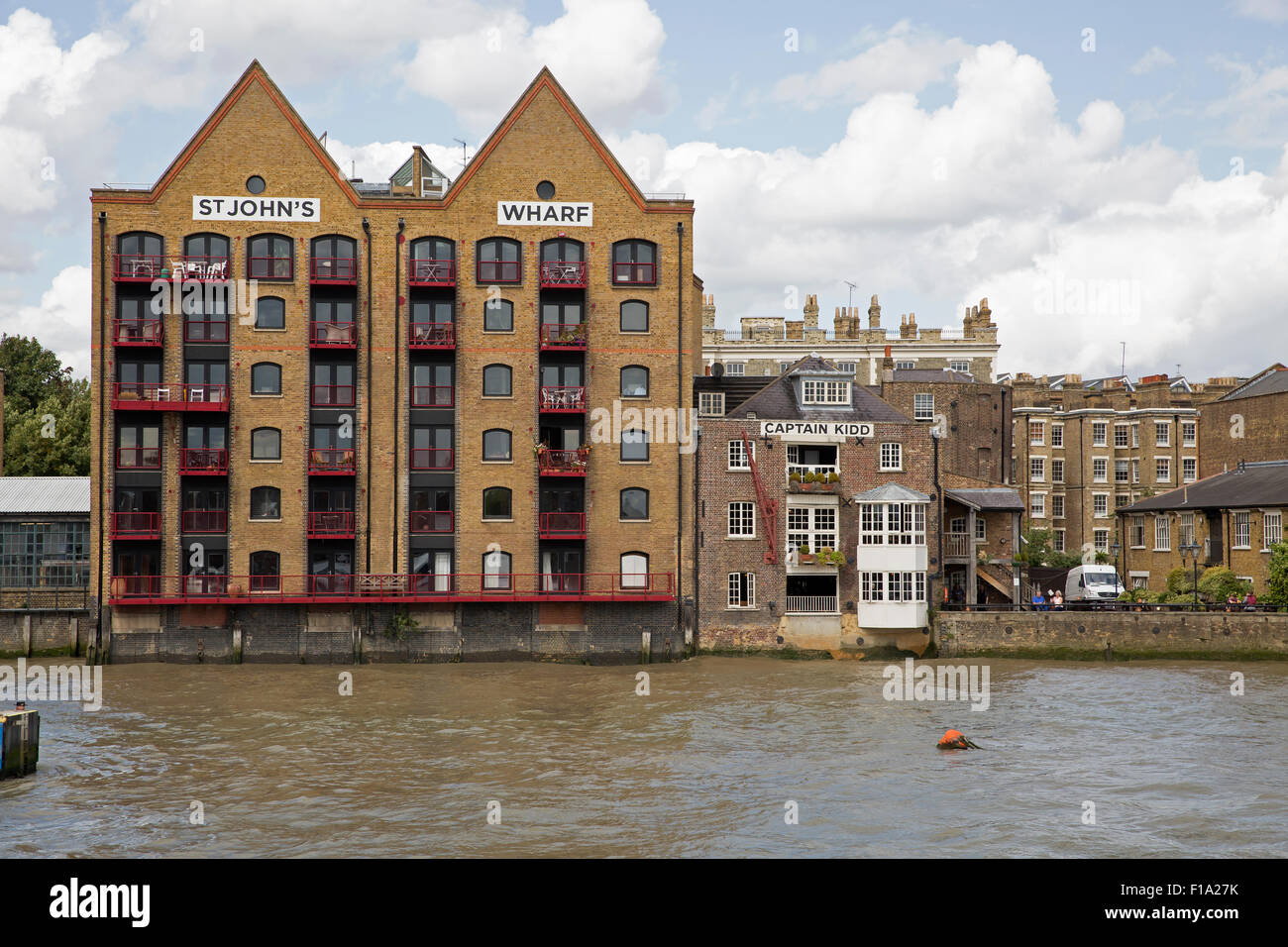 Riverside apartments and office buildings as seen from the River Thames ...
