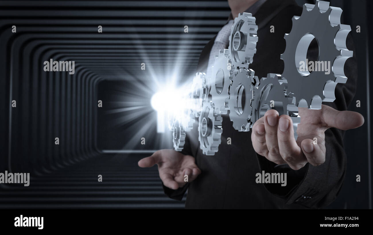 businessman hand draws gear to success concept Stock Photo - Alamy