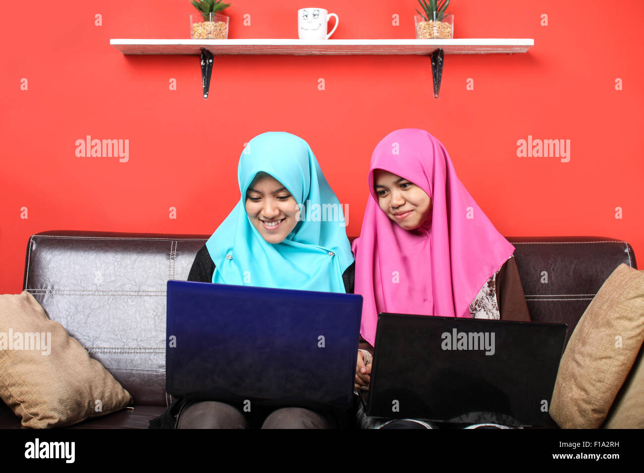 image of two young muslim women using laptops during meeting Stock ...