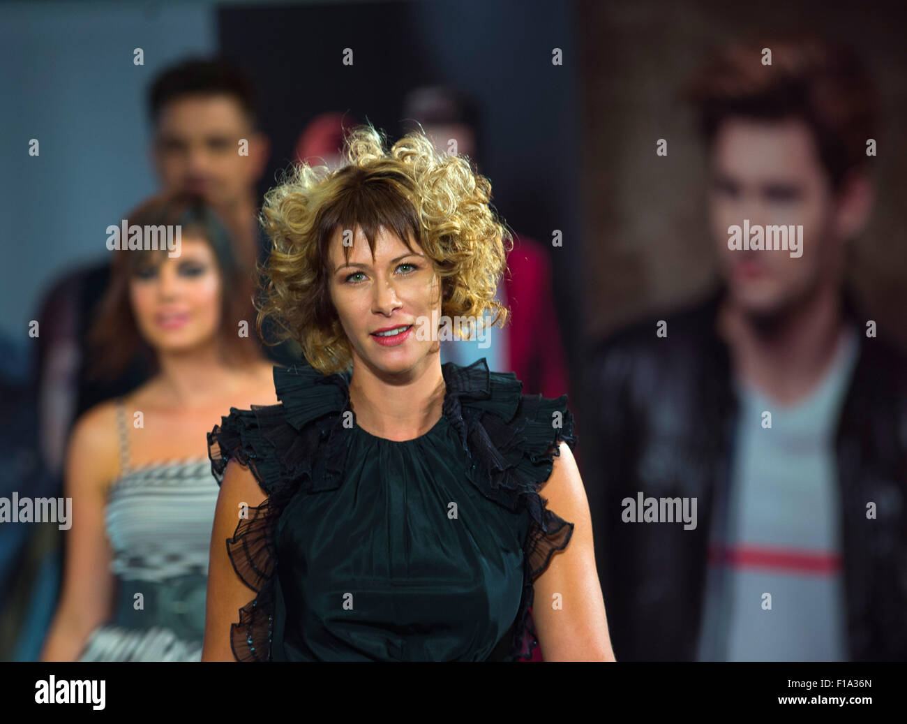 Nauheim, Germamy. 30th Aug, 2015. Model Carmen poses in a curly 'Bob ...