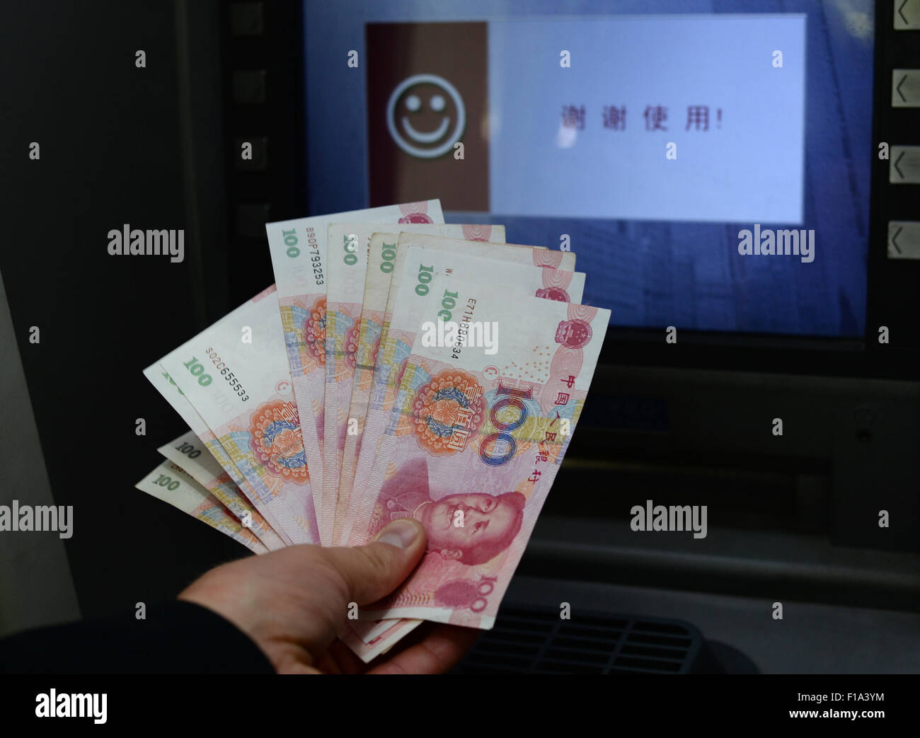 Shanghai, China. 28th Aug, 2015. Renminbi banknotes, the official ...