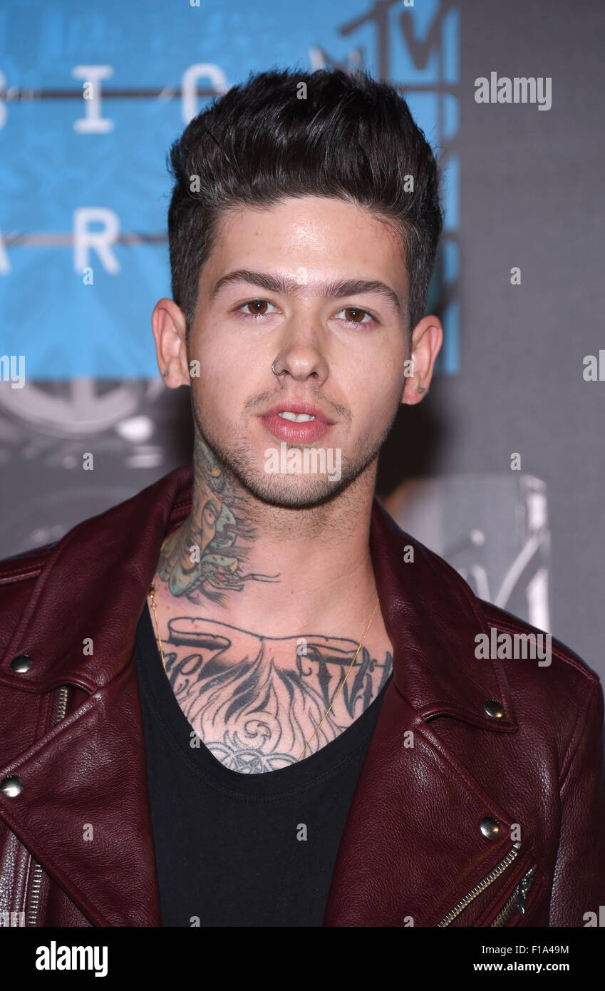 Los Angeles, California, USA. 30th Aug, 2015. Travis Mills arrives for ...