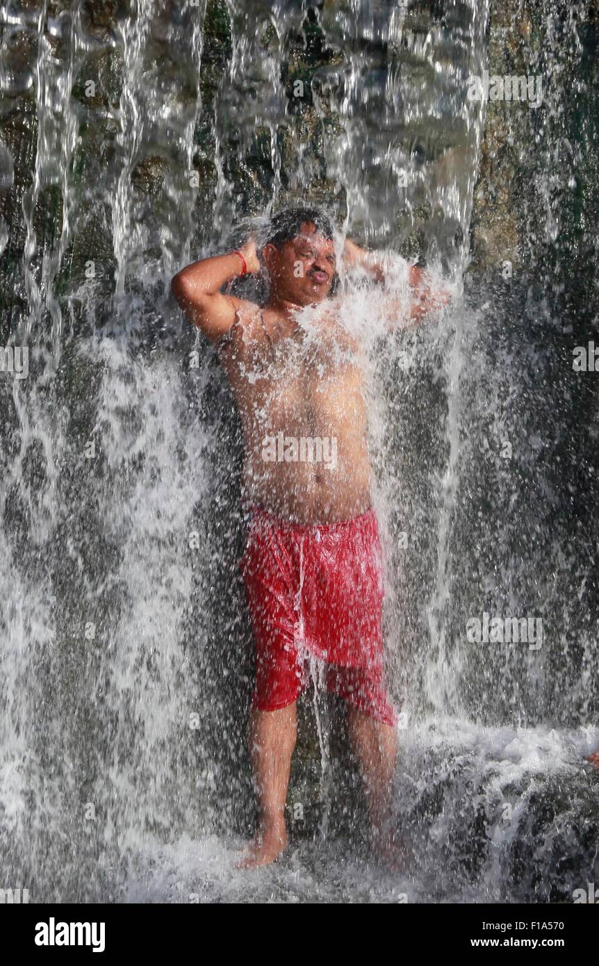 Nashik, India. 31st Aug, 2015. Hindu devotee taking a bath in the ...